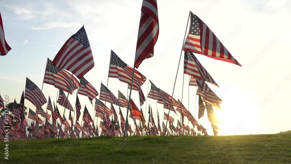 Set of American flags fluttering in the wind on the Memorial Day On the ...