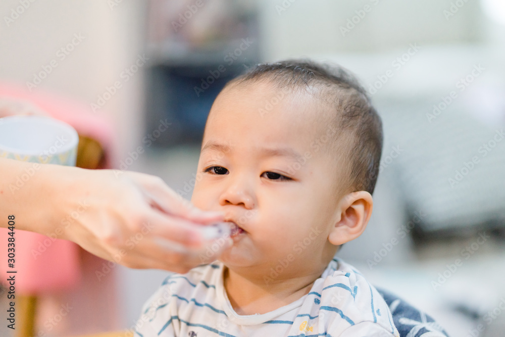 Little baby boy un accept to drink medicine syrup with syringe. Stock ...