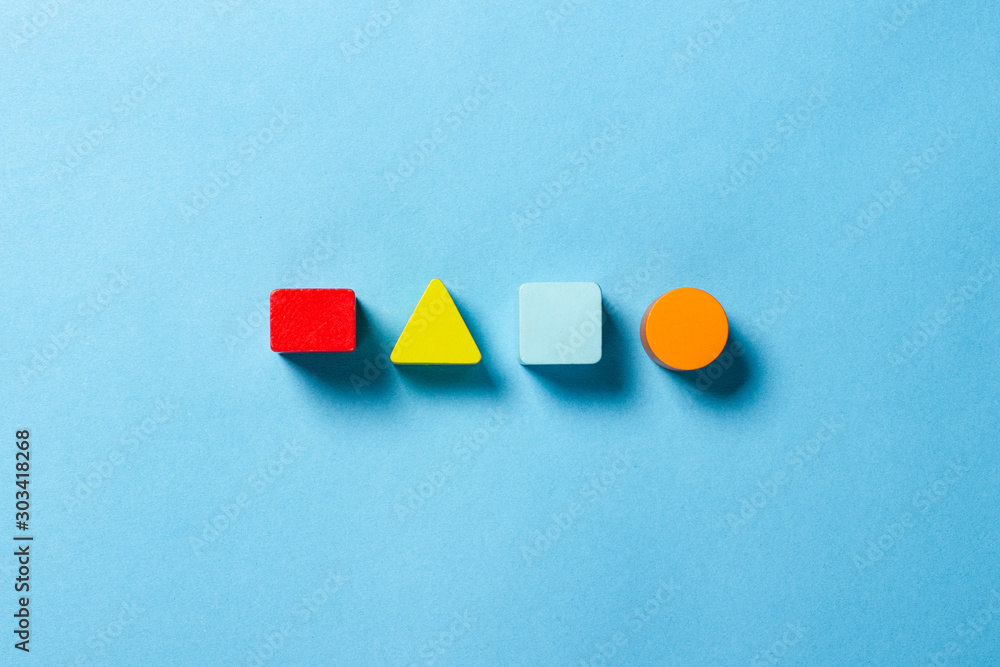 Children's educational toys geometric shapes for logic on a blue ...