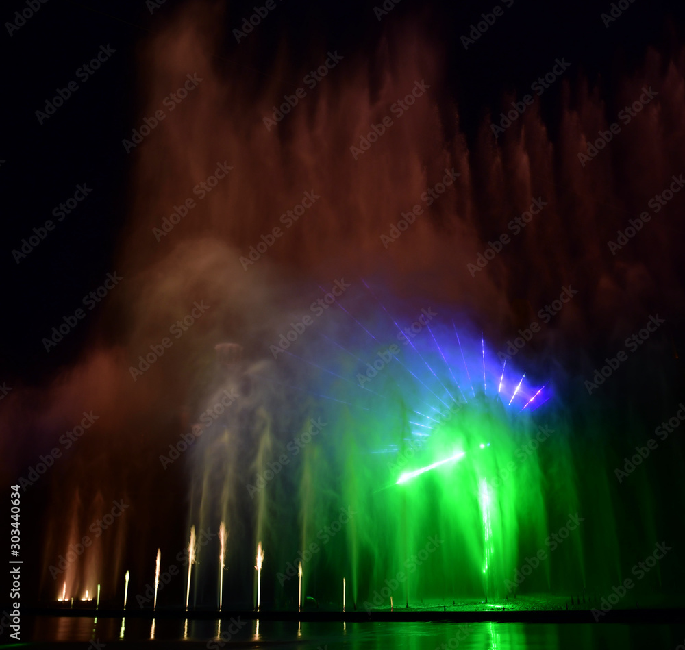 Colorful water fountains. Beautiful laser and fountain show. Large ...