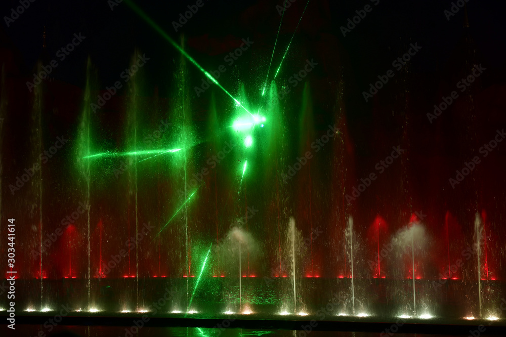 Colorful water fountains. Beautiful laser and fountain show. Large ...