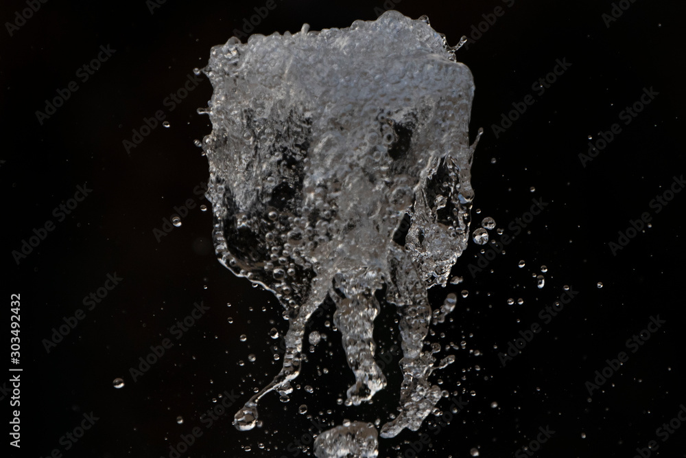 Water fountain jet creating strange figures Stock Photo | Adobe Stock