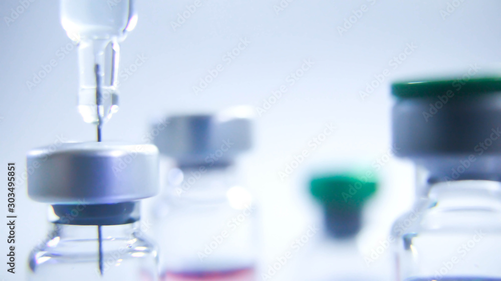 Vaccine vial dose flu shot drug needle syringe,medical concept ...