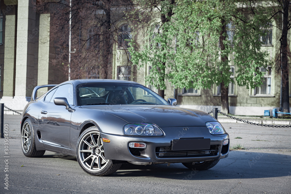 A very rare Japanese sports car in the back of a Toyota Supra coupe in ...