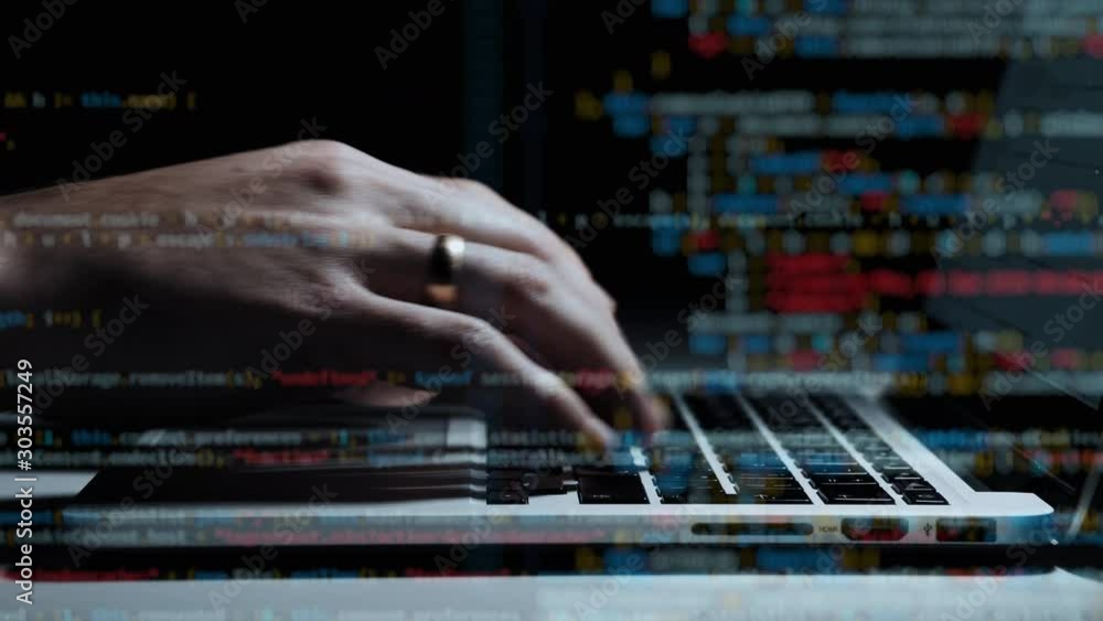 Cinematic close up of hands typing code on a keyboard with Multiple layers of codes and ...