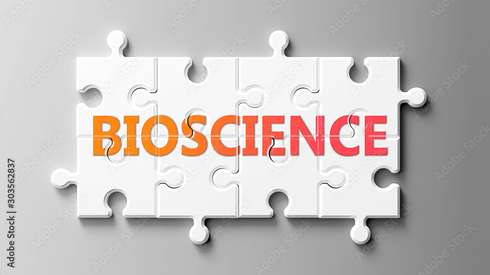 Bioscience complex like a puzzle - pictured as word Bioscience on a puzzle pieces to show that ...