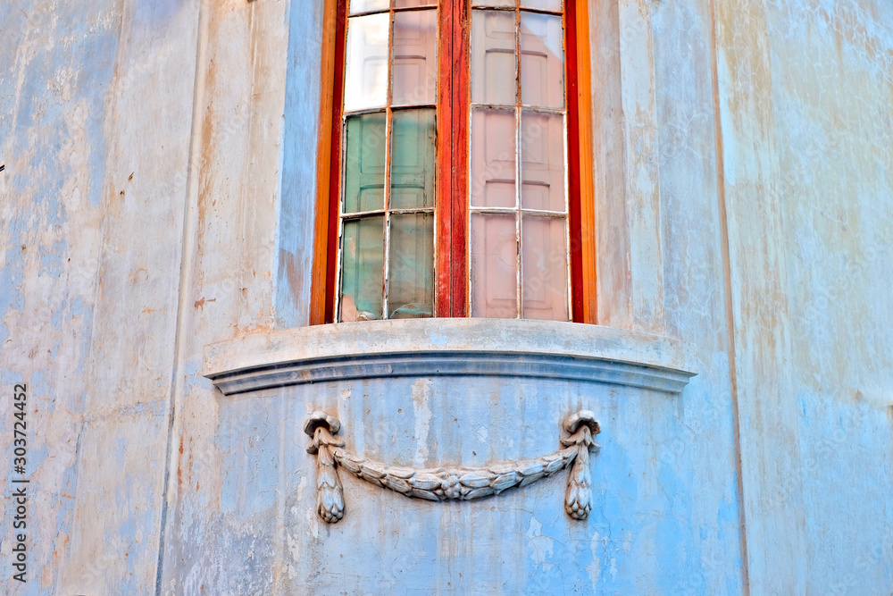 Abstract architecture detail: a beautiful corner window with warm ...