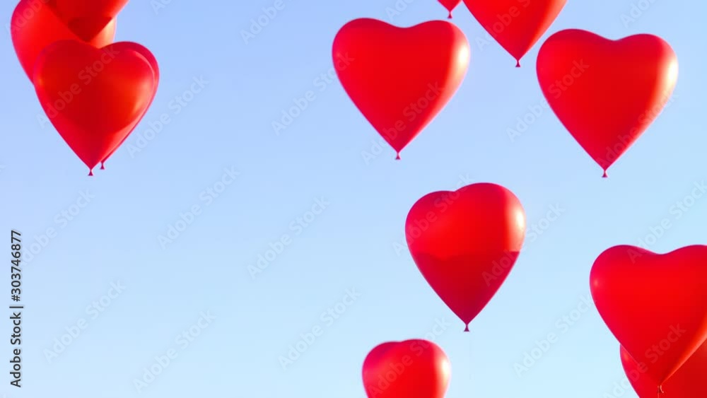 Seamless looping animation with many heart-shaped red balloons. Love ...