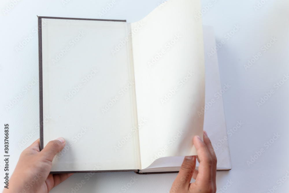 The first page of the book is thick. Stock Photo | Adobe Stock