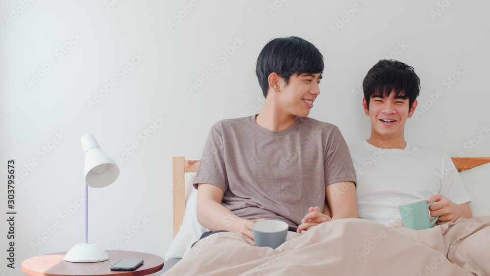 Asian Gay Men Couple Talking Having A Great Time At Modern Home Young