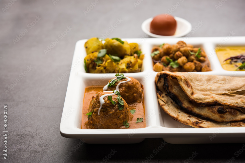 Indian vegetarian Food Thali or Parcel food-tray with compartments in ...