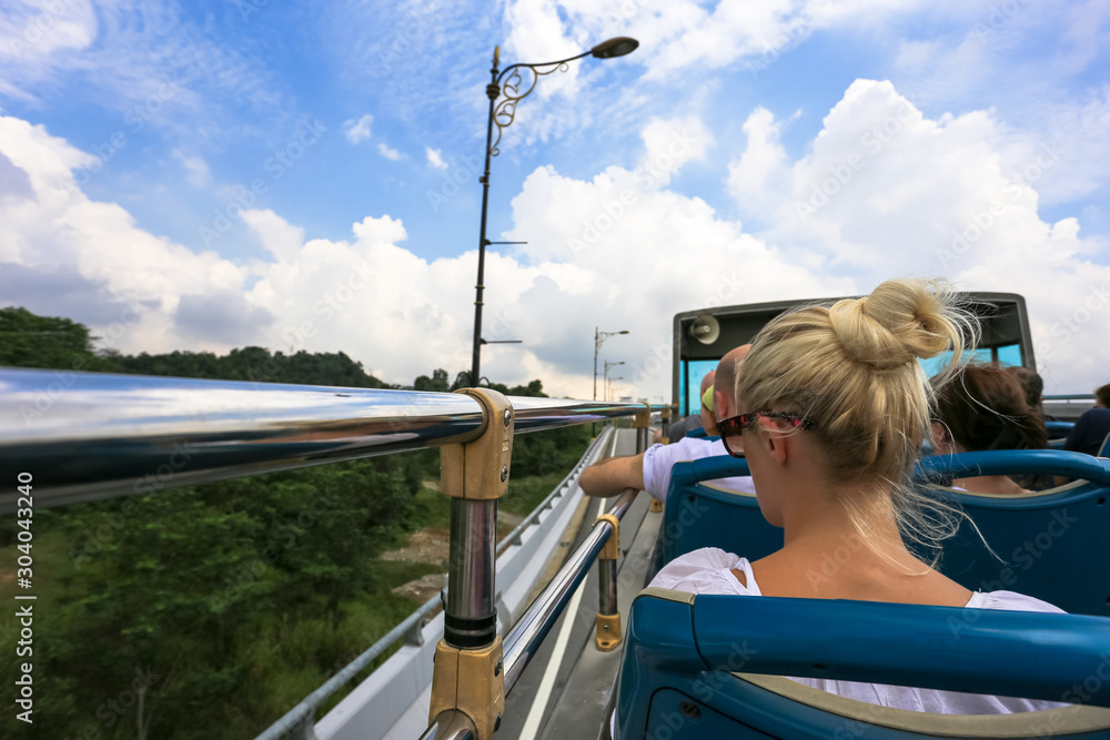 Open bus top view of tourist activity on double decker bus and motion ...