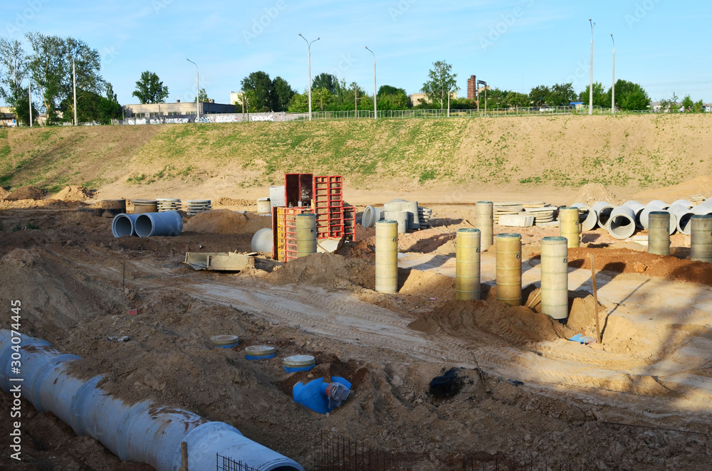Laying or replacement of underground storm sewer pipes. Installation of ...