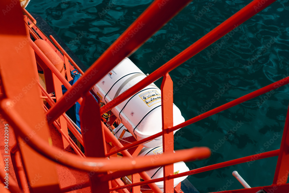 Inflatable liferaft in hard-shelled canister. Lifeboat, rescue vessel ...