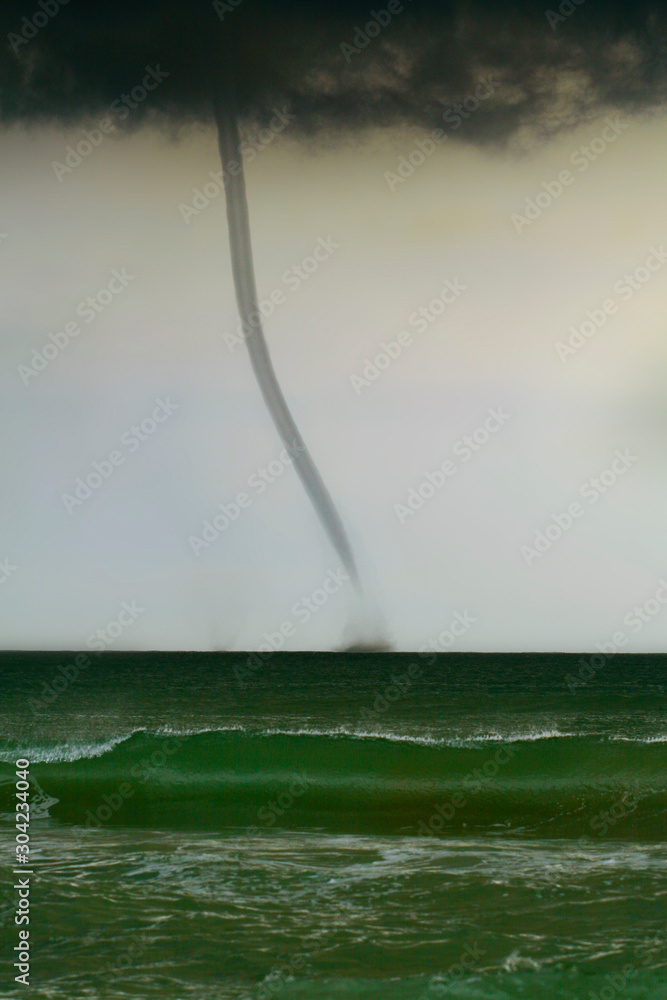bad weather and storm with the wind on the sea. tornado over the ocean ...