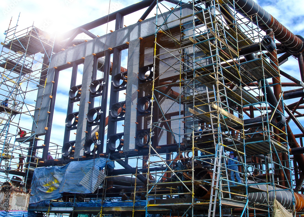 Oil rig platform during construction site in the harbor yard and ...