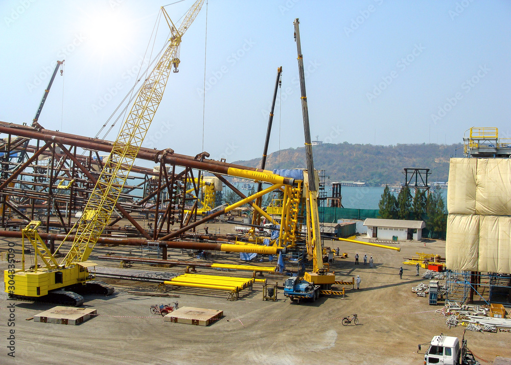 Oil rig platform during construction site in the harbor yard and ...
