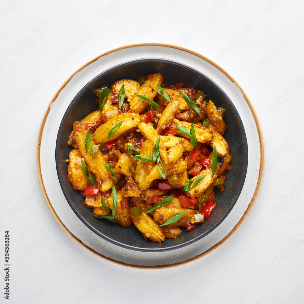Baby Corn Manchurian dry looks like Schezwan Baby Corn isolated at ...