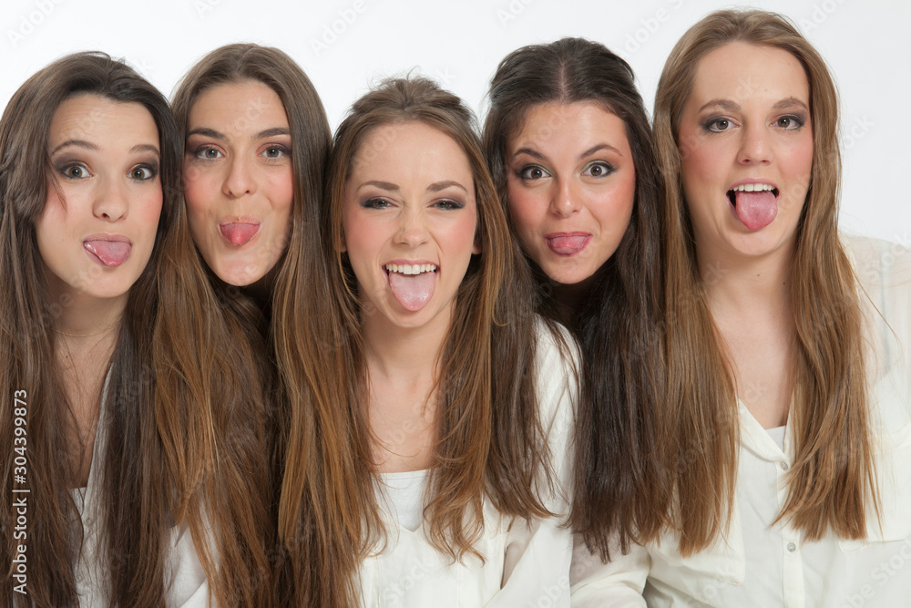 Girls sticking out tongue Stock Photo | Adobe Stock