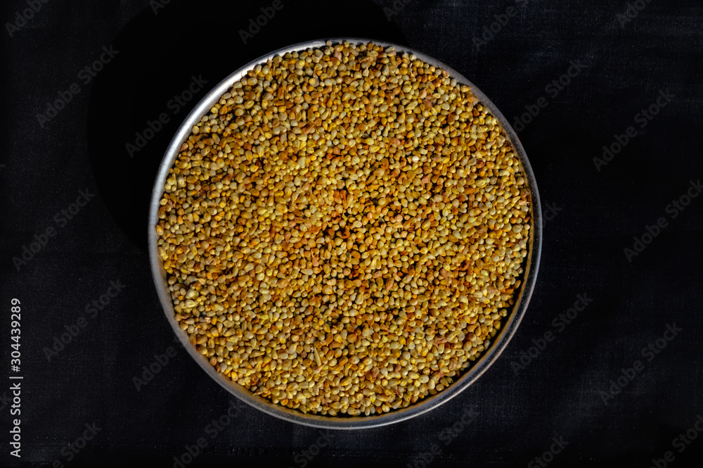 bajra grain on steel bowl,millet Grain bajri on black background ...