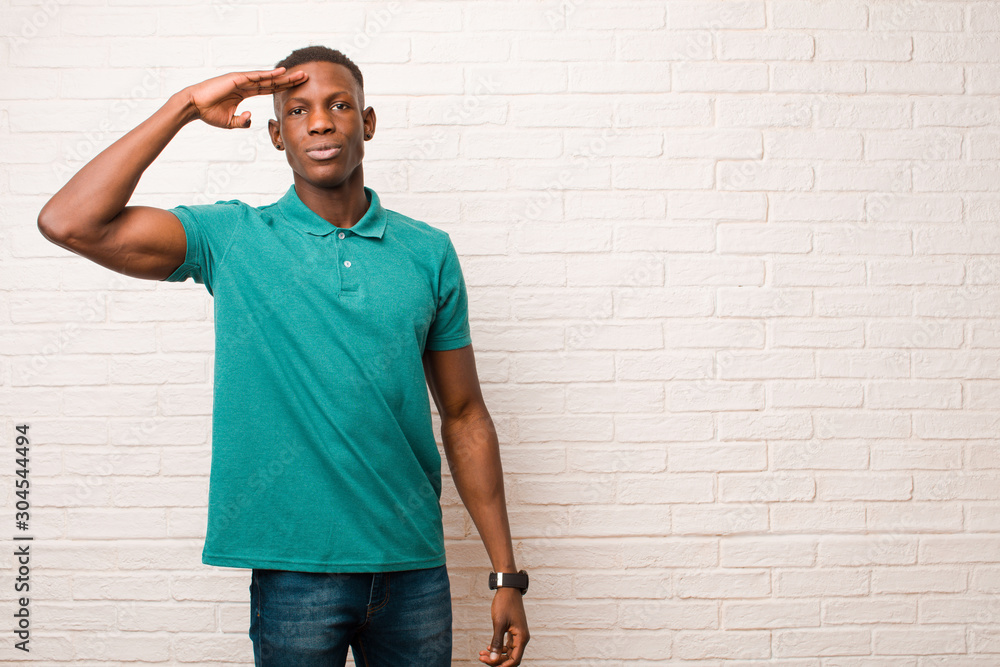 young african american black man greeting the camera with a military ...