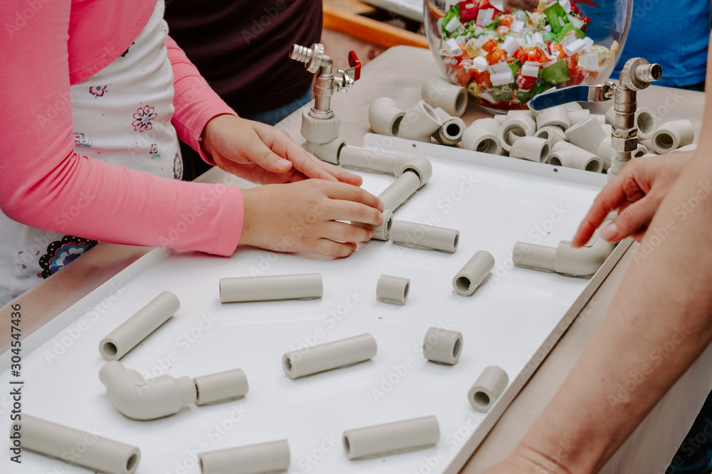 Activity for kids indoor, play and creativity concept. Kids are playing ...