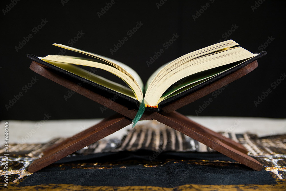 Muslims Islamic Holy Book Quran Majid with Quran wooden stand and ...