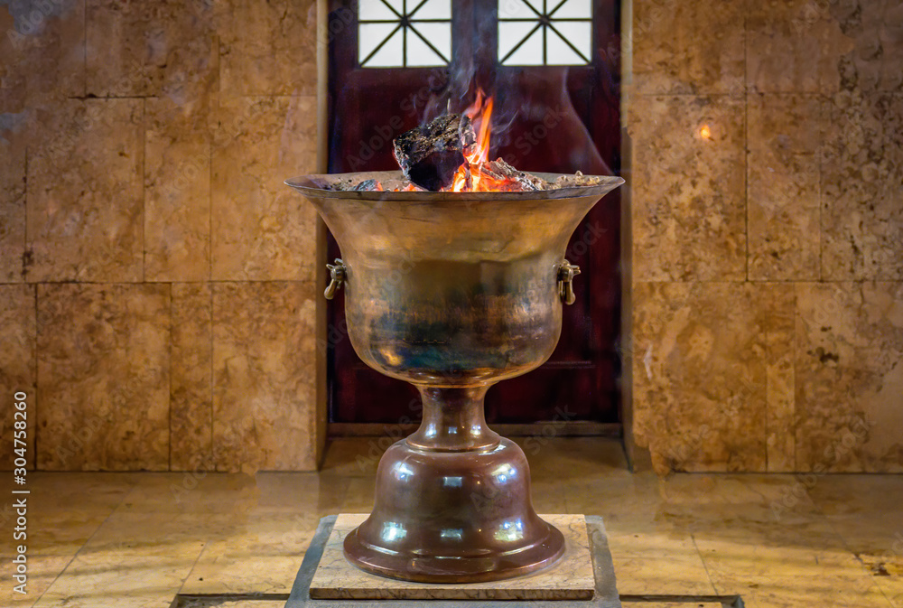 The eternal fire in Ateshkadeh Zoroastrian fire temple in Yazd, Iran ...