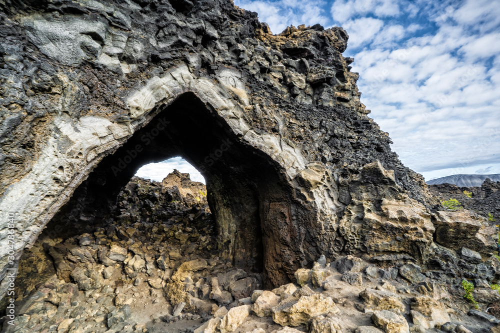 Dimmuborgir, a labyrinth of huge lava monoliths, towers and cavern near ...