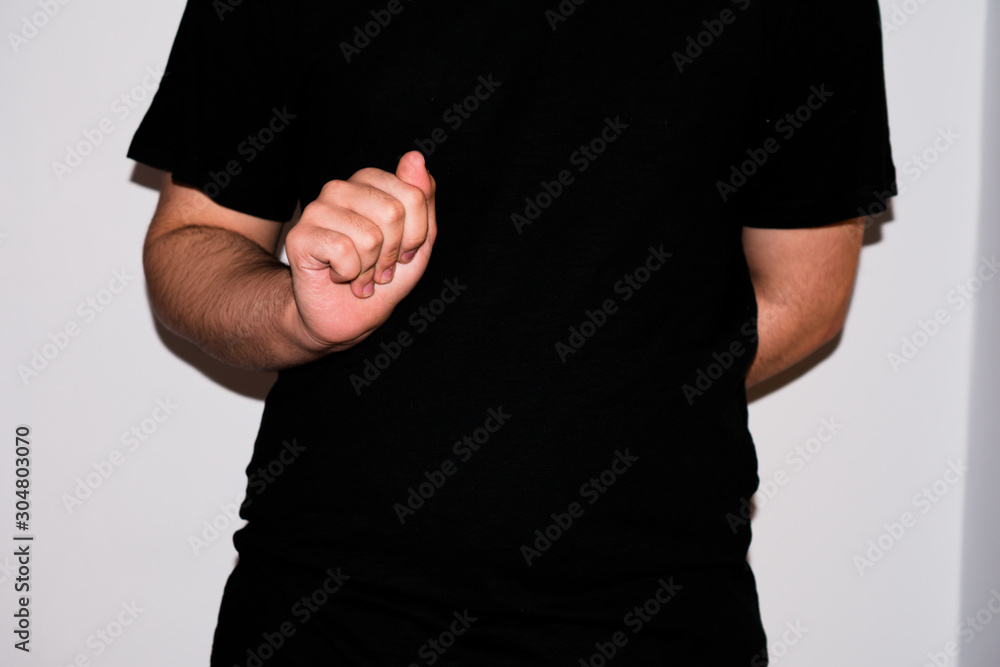 Young sign-language interpreter, showing an "A" in American Sign ...