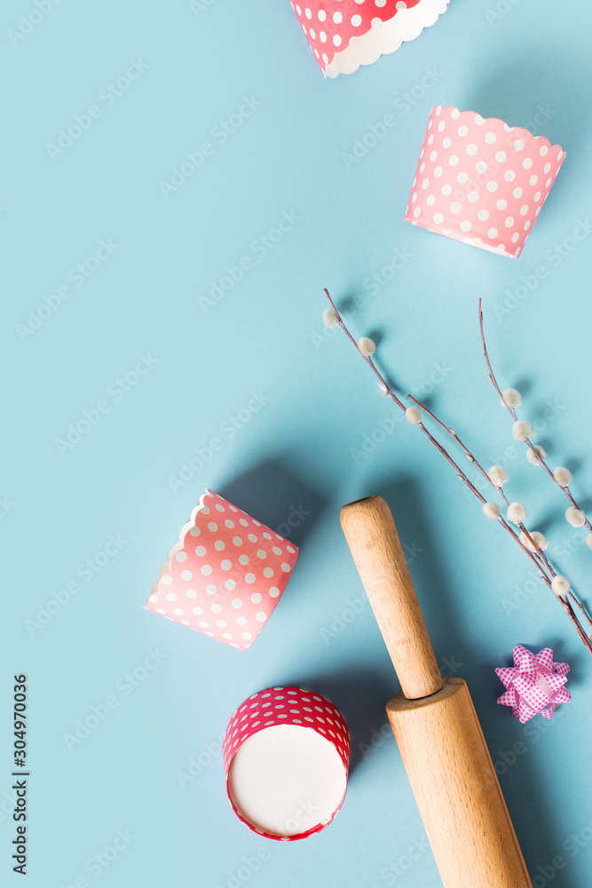 Baking and spring background with pink cake forms and branch Stock ...