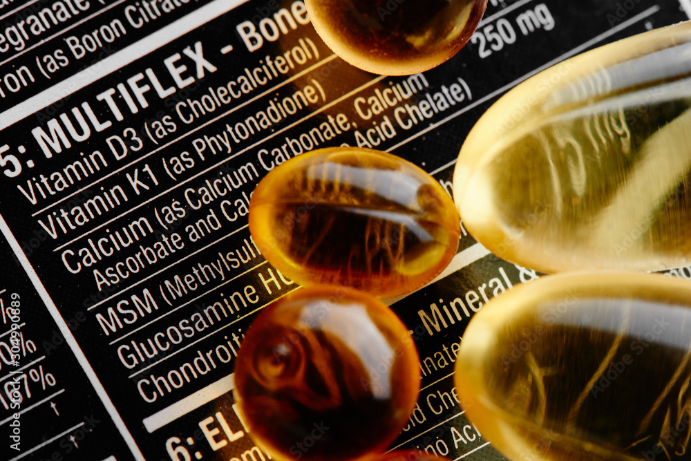 Close-up of a black label with supplements facts of a multivitamin ...