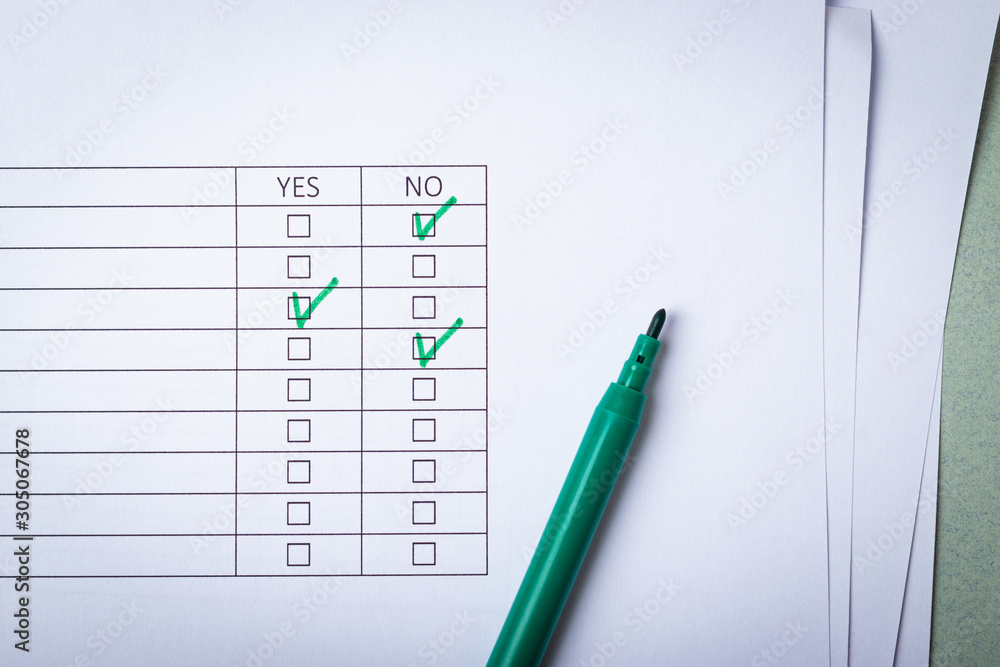 Check list and green marker Stock Photo | Adobe Stock