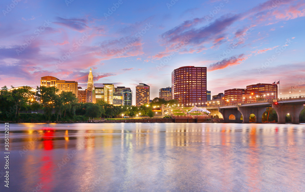 The skyline of Hartford, Connecticut at sunset. Photo shows Founders ...