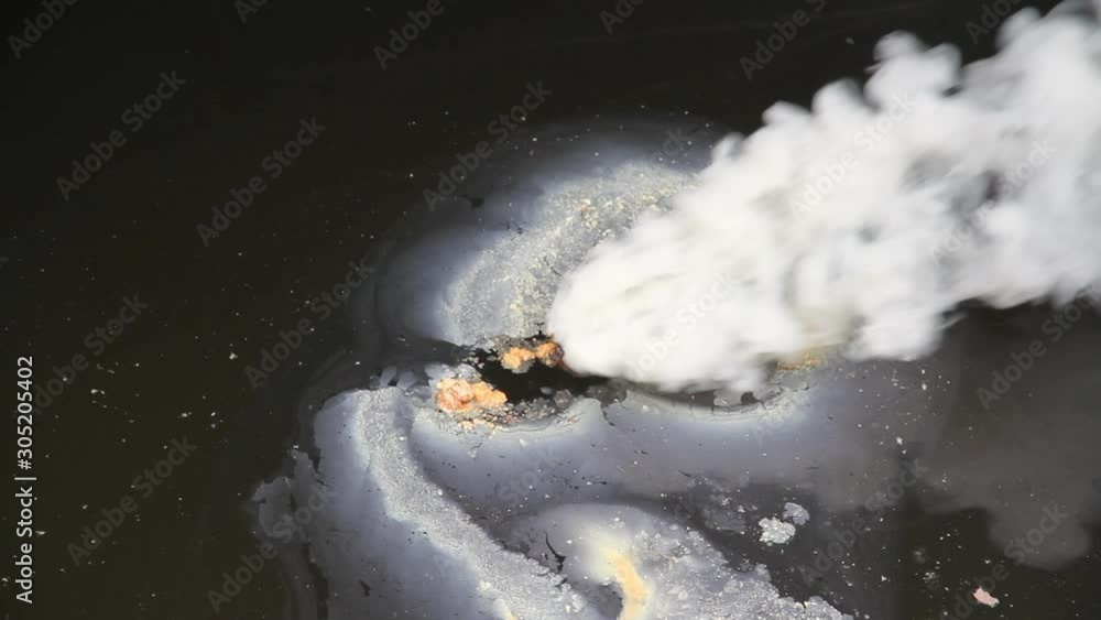 Geyser Volcanic Activity. Poisonous sulfur dioxide smoke flows from a ...