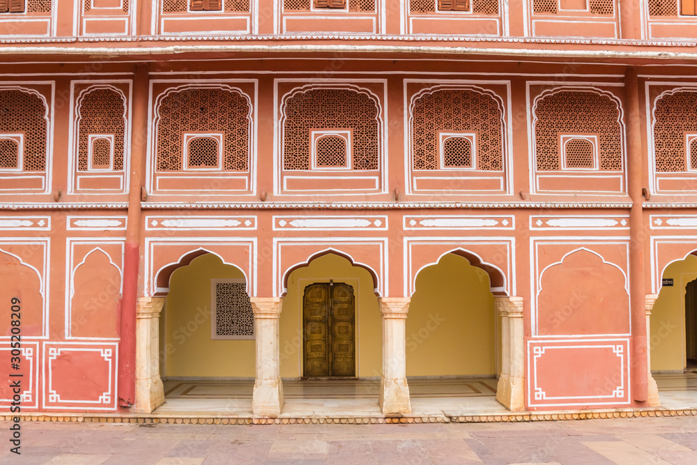 Pink facade of the Chandra Mahal building at the city palace in Jaipur ...