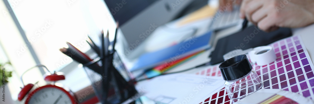 Test print paper page with colour test design fantail and magnifying ...