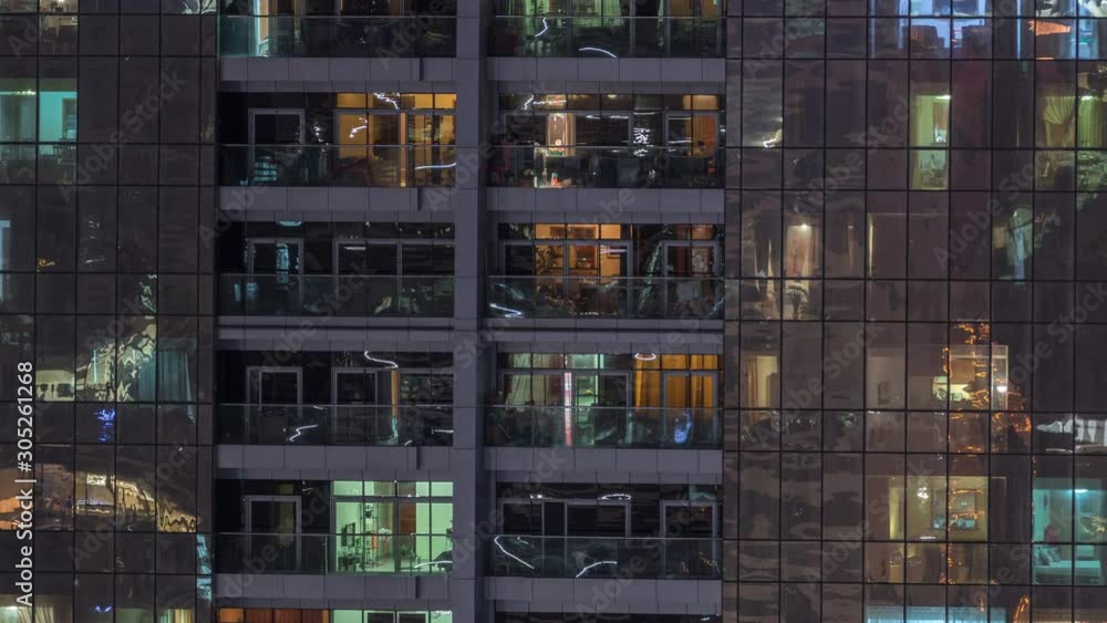 Night view of exterior apartment building timelapse. High rise ...