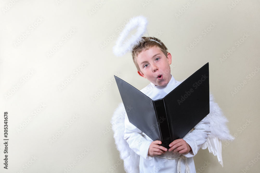 Boy angel singing in the choir Stock Photo | Adobe Stock