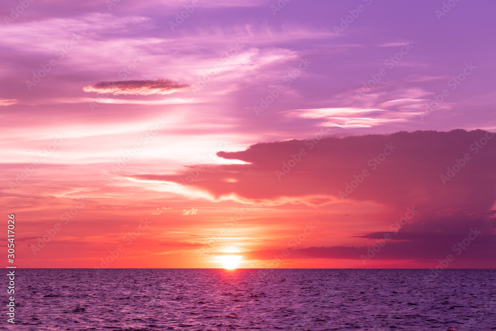 Beautiful landscape beach and sea and purple sky at the sunset ...
