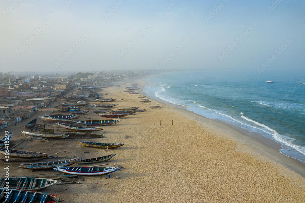 Aerial view of fishing village, pirogues fishing boats in Kayar ...