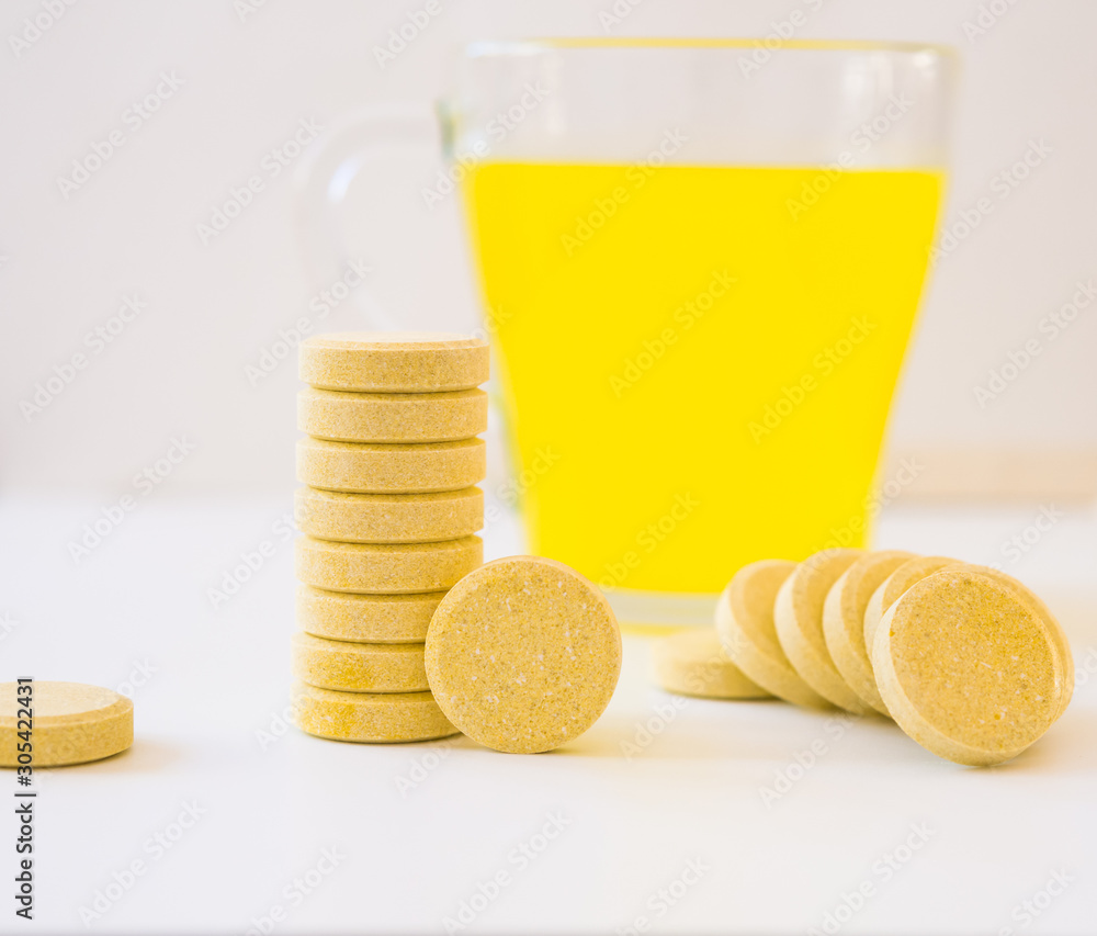 Multivitamin supplement tablet. Soluble Vitamin. Fizzy tablet. Orange ...