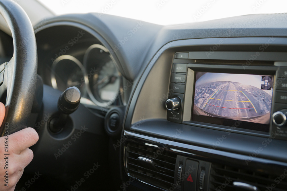 Car interior. Parking sensor with reversing image in off-road ...