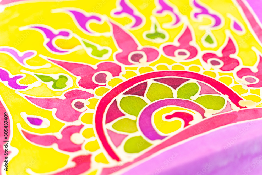 The art of coloring on fabrics using brushes. Stock Photo | Adobe Stock