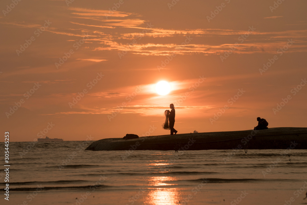 Beautiful sunset nature background, unknown fisherman with net fish on ...