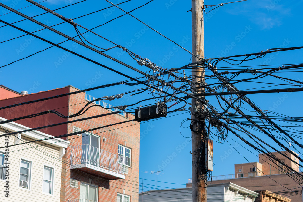 Telephone Lines and Pole in front of Residential Buildings and Homes in ...