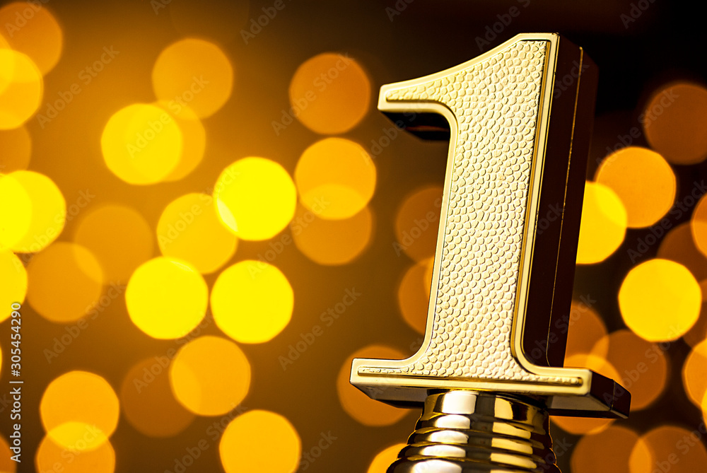 Ist place winners award trophy with gold number Stock Photo | Adobe Stock
