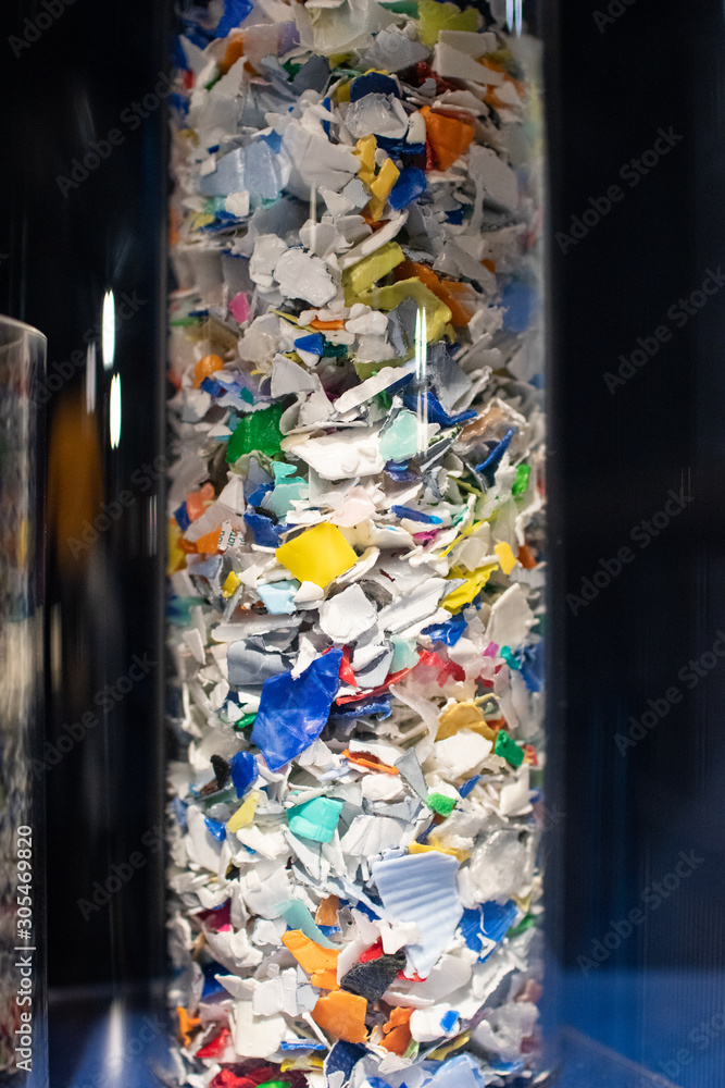 microplastic flakes in a cylinder to teach recycling of plastics ...