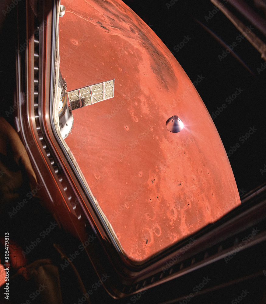 Fictional image of planet Mars and an orbiter capsule seen through a ...