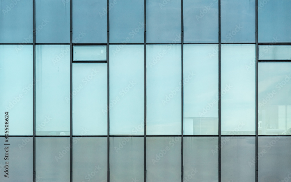 Glass facade texture of a modern office building. High tech ...